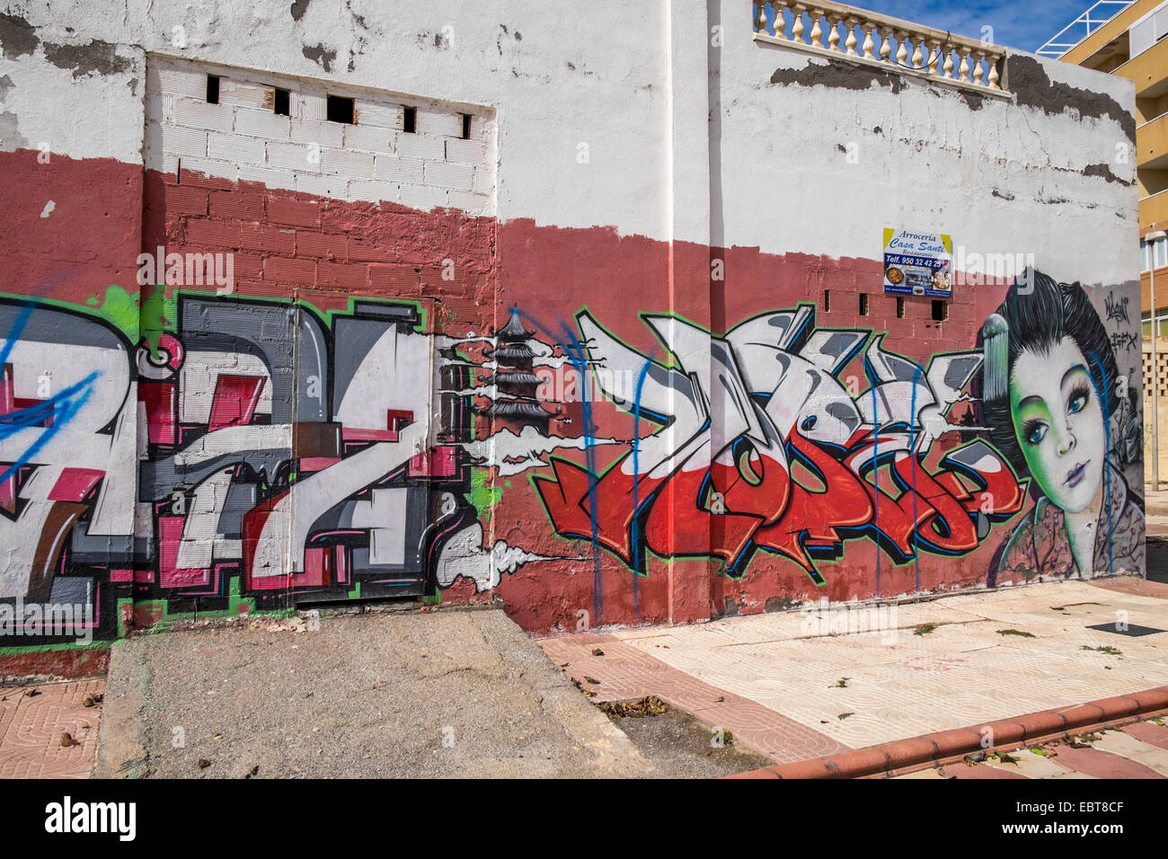 Spray painted graffiti wall Stock Photo - Alamy