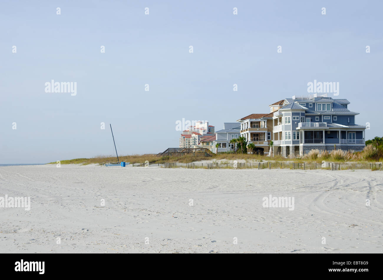 A row of oceanfront, upscale, beach houses and condominiums. Taken just ...