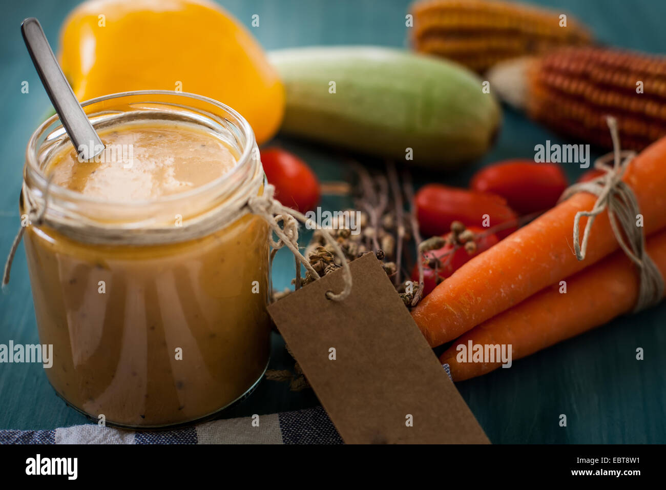 vegetables cream in glass bottle with label Stock Photo - Alamy