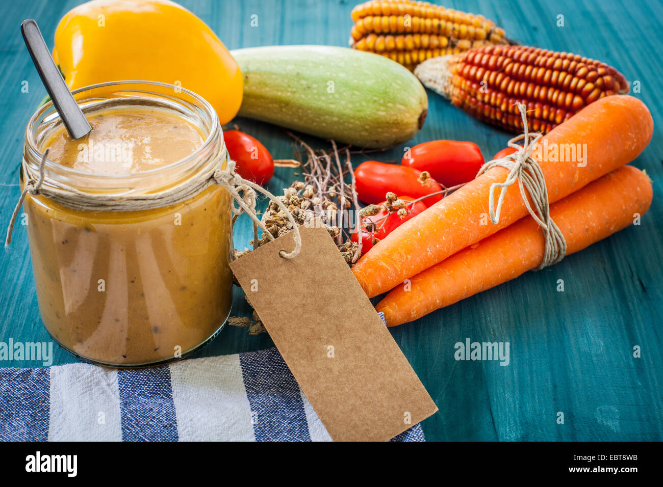 vegetables cream in glass bottle with label Stock Photo - Alamy