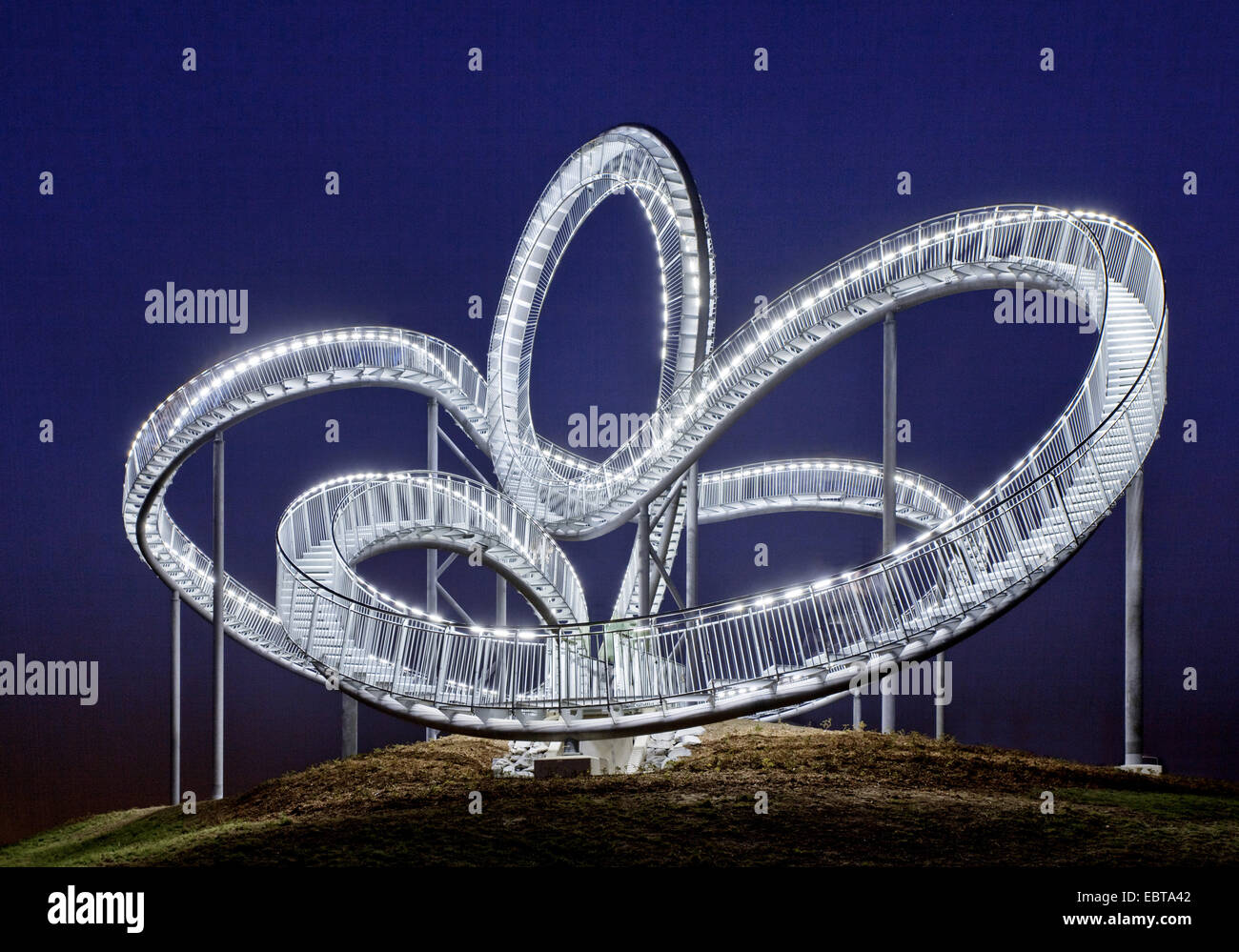 illuminated landmark Tiger and Turtle on stockpile Angerpark, Germany ...