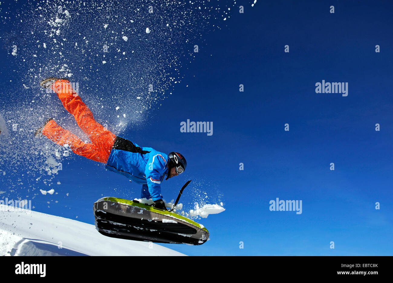 Snow sled jump hi-res stock photography and images - Alamy