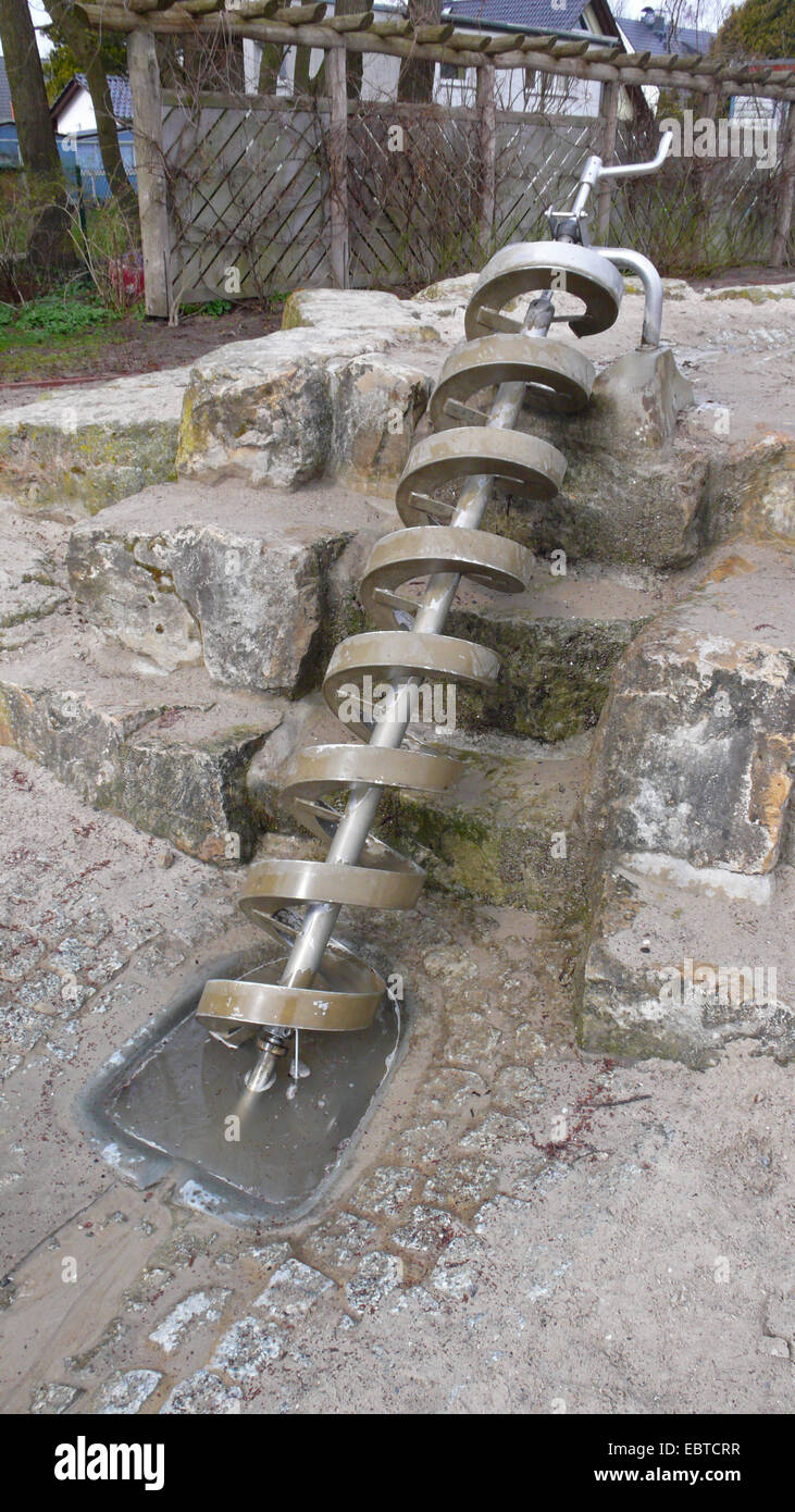 Archimedean water screw on a playground, Germany, Mecklenburg-Western ...