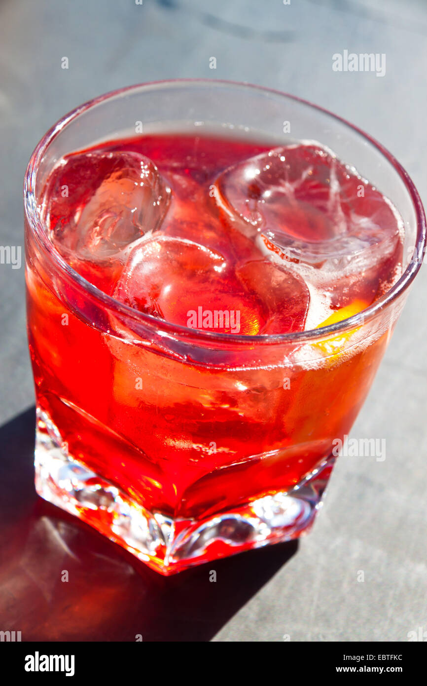 glass of Campari on the rocks Stock Photo - Alamy