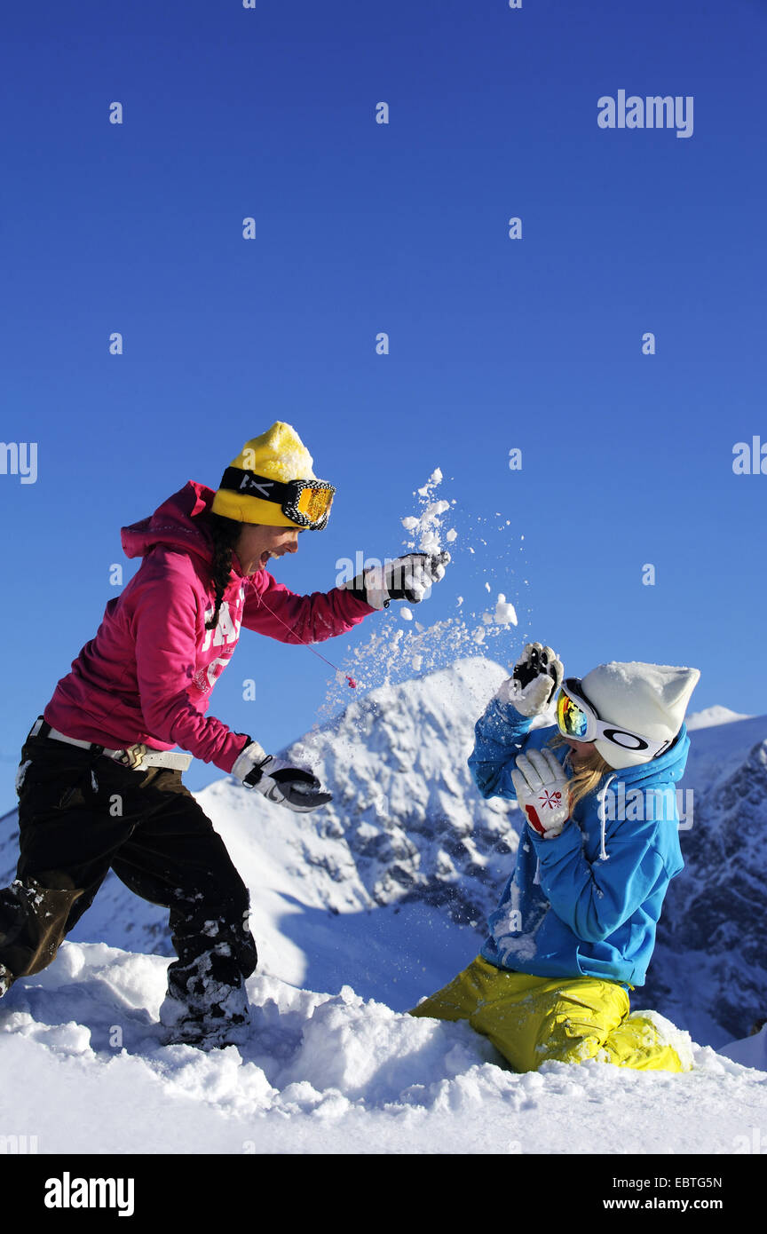 Teenagers winter snowball fight hi-res stock photography and images - Alamy