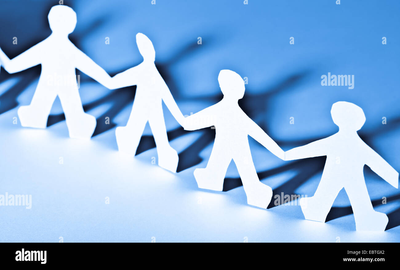 Paper people in teamworking concept Stock Photo - Alamy