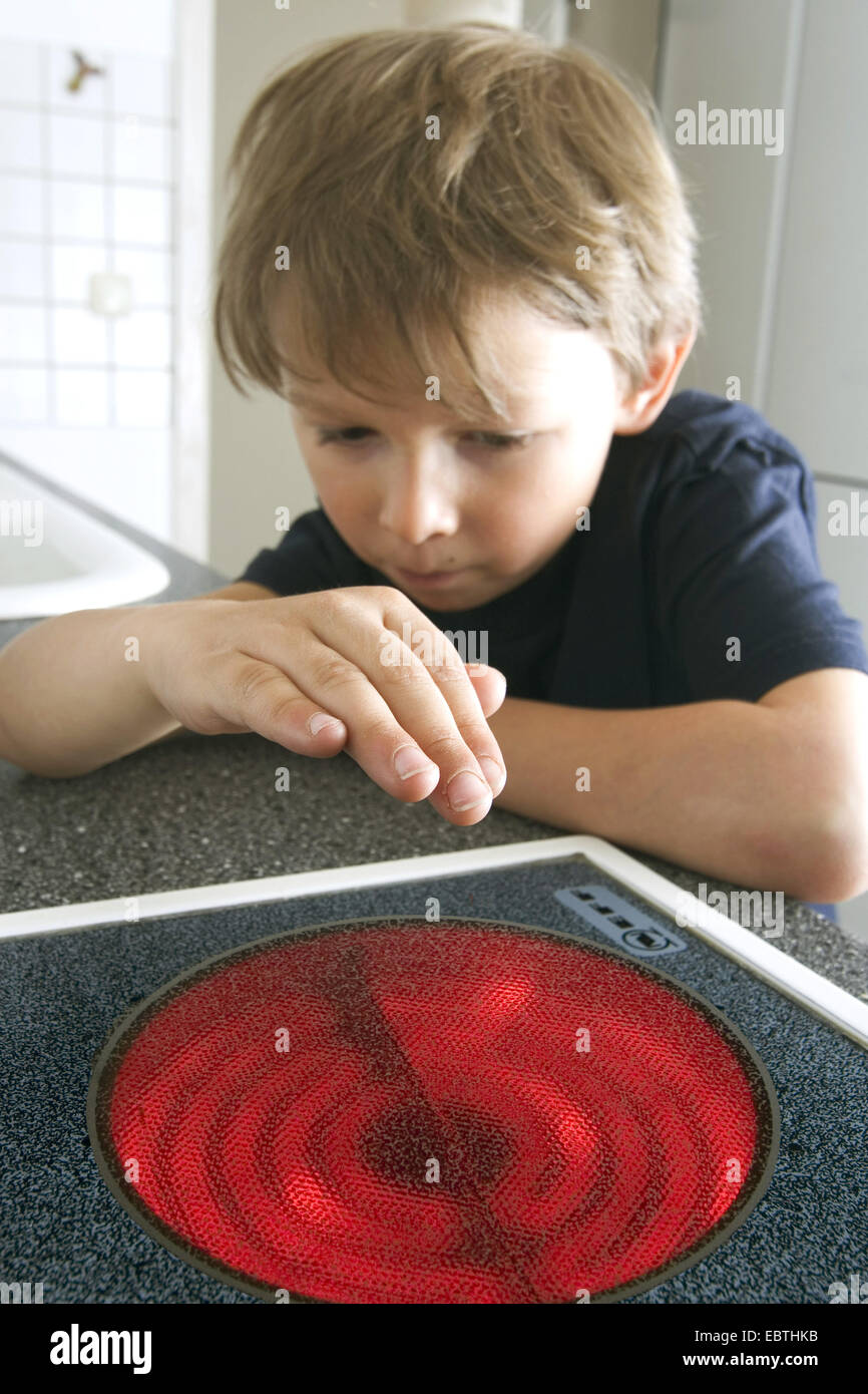 Boy reaching out hand hi-res stock photography and images - Alamy