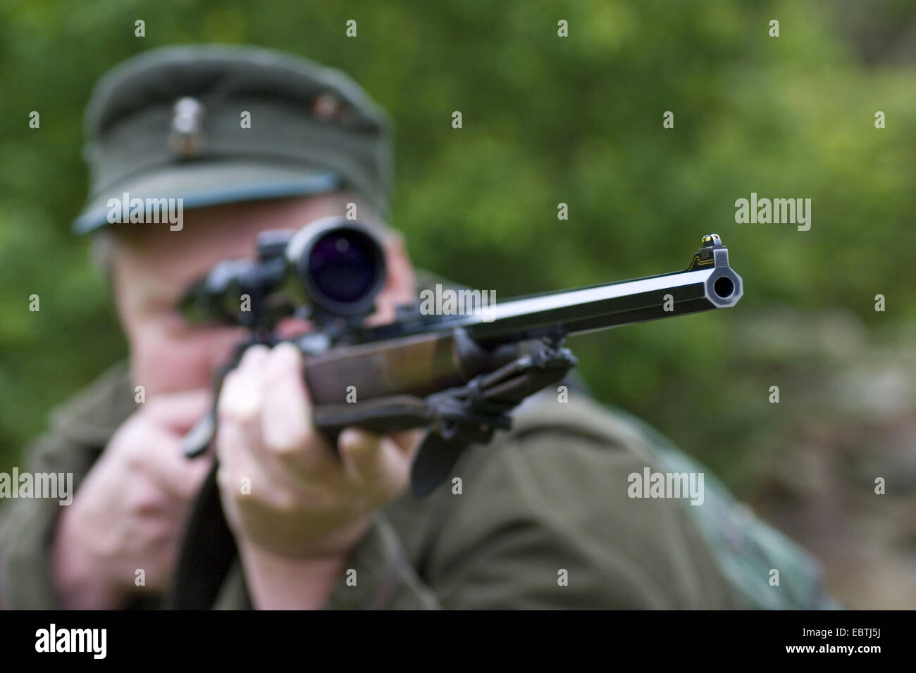 hunter aiming with a gun, Germany Stock Photo - Alamy