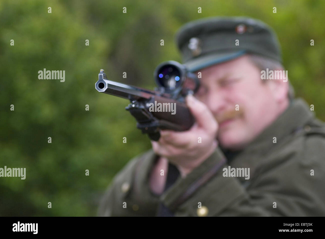 hunter aiming with a gun, Germany Stock Photo - Alamy