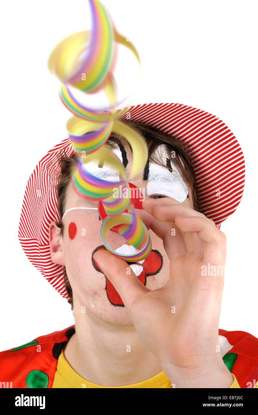 Clown blowing hi-res stock photography and images - Alamy
