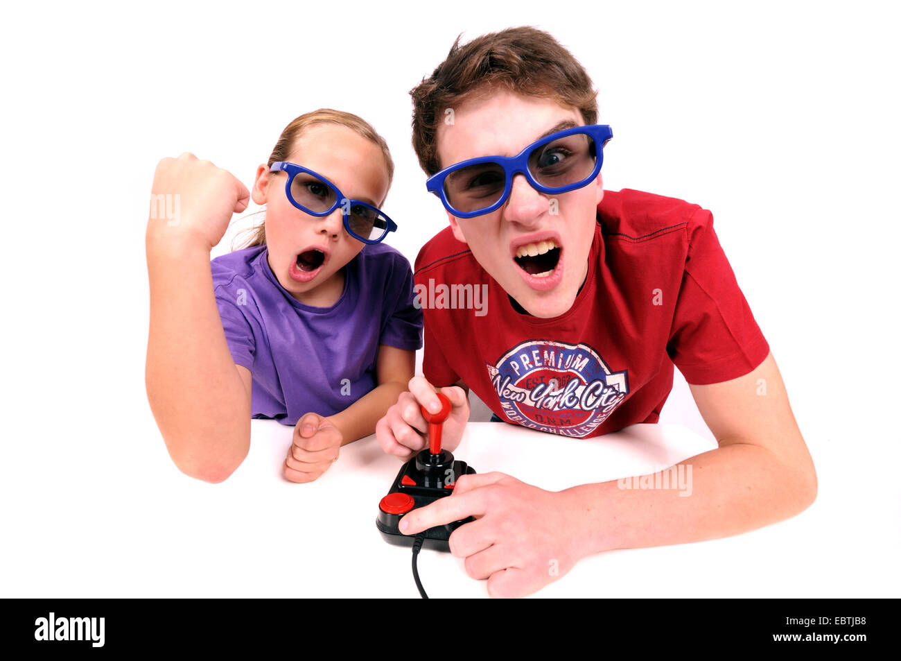 Two kids playing video games Cut Out Stock Images & Pictures - Alamy