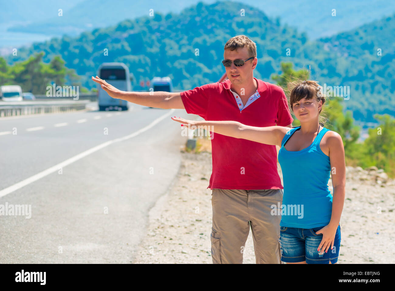 Young people travel freely on passing cars Stock Photo - Alamy
