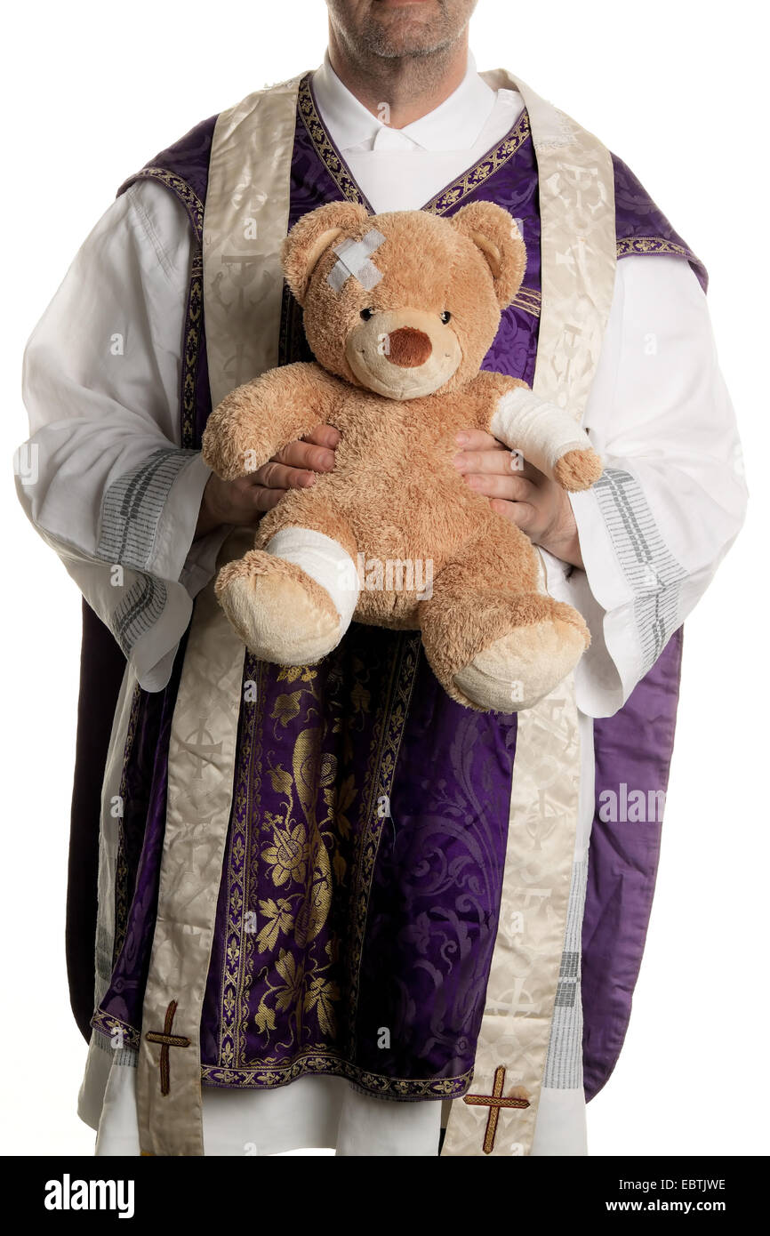 symbol picture 'sexual abuse at church': priest with teddy bear in ...