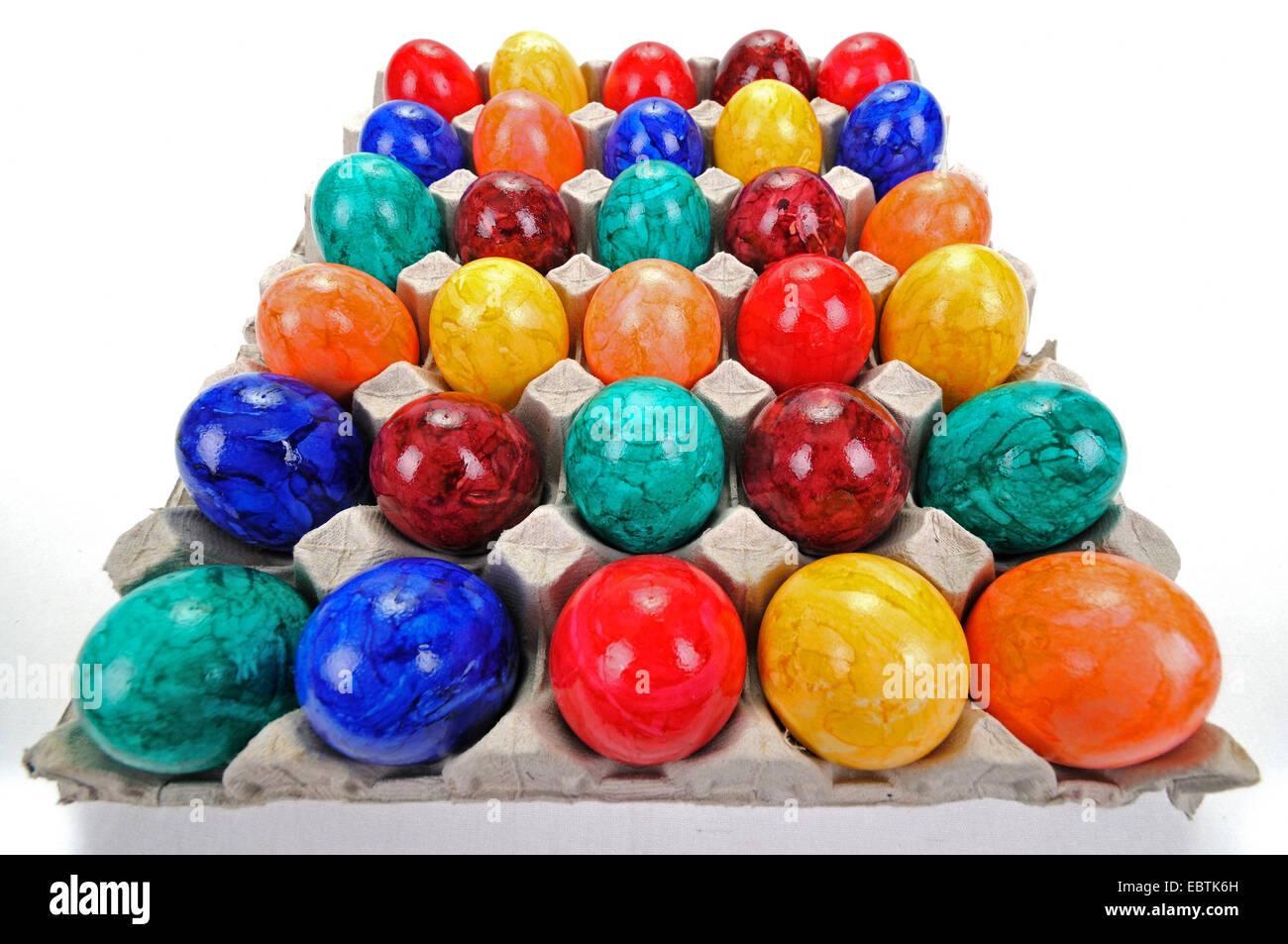 colourful easter eggs in an egg carton Stock Photo - Alamy