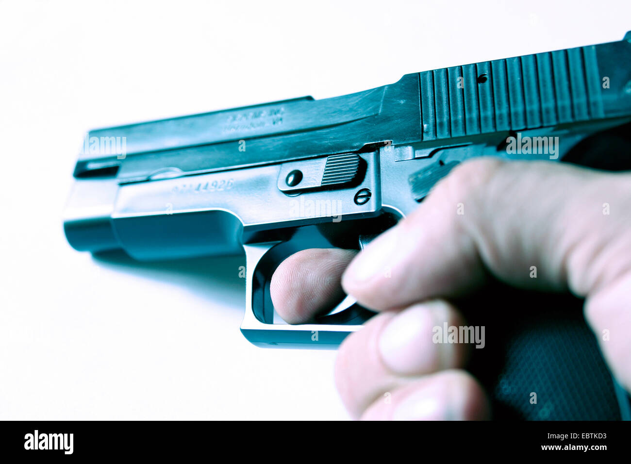 Pistol in hand hi-res stock photography and images - Alamy
