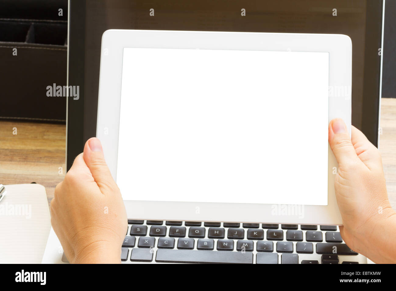 Hands holding tablet Stock Photo - Alamy