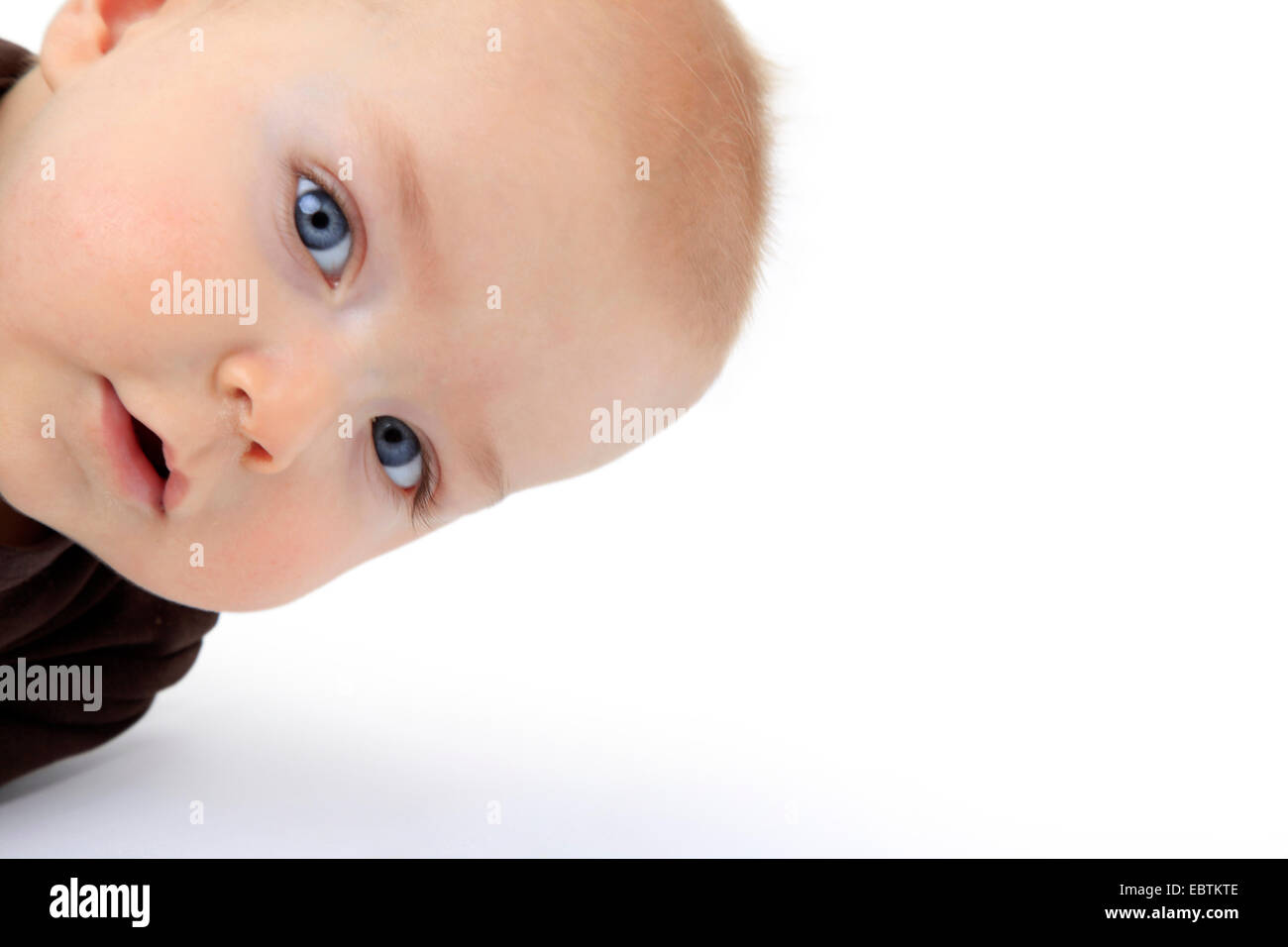 baby looking at the camera curiously Stock Photo - Alamy