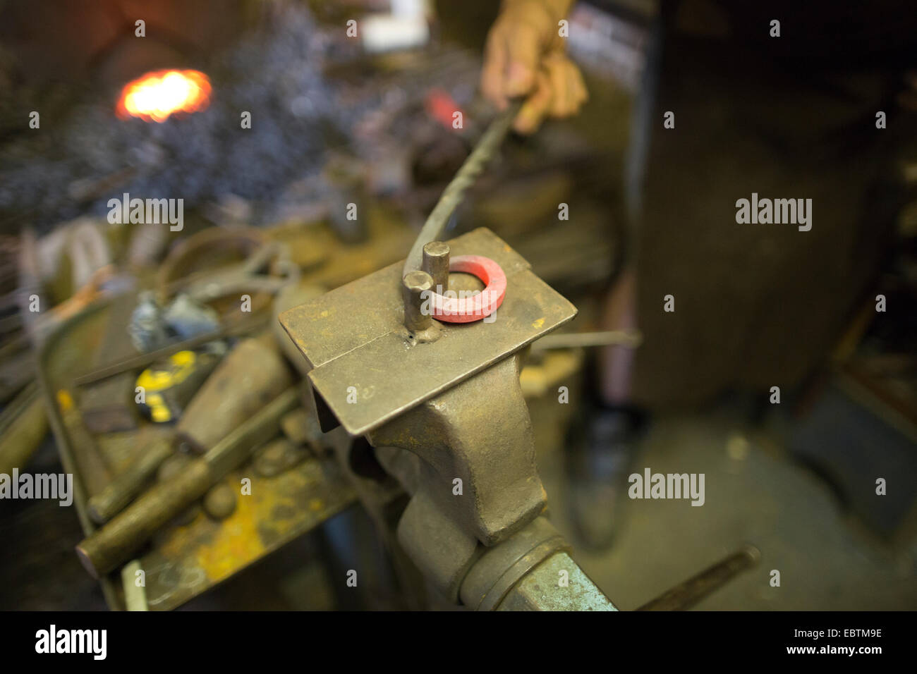 Woman blacksmith working in forge hi-res stock photography and images ...