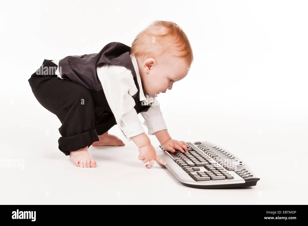 little child with computer keyboard Stock Photo - Alamy