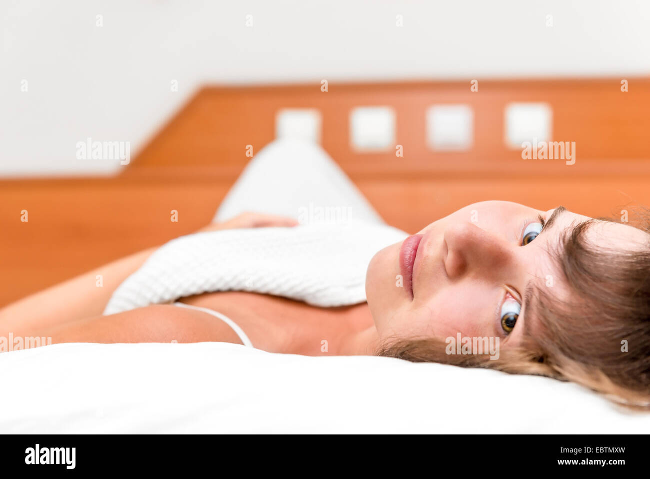 Woman bed under covers hi-res stock photography and images - Alamy