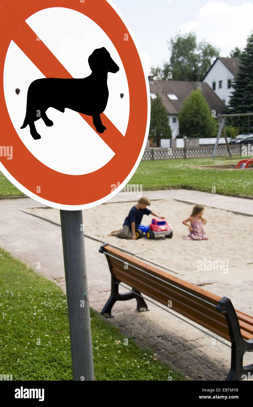 dogs forbidden sign in front of children's playground, Germany Stock ...