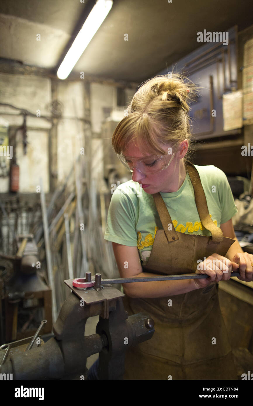 Woman blacksmith working in forge hi-res stock photography and images ...