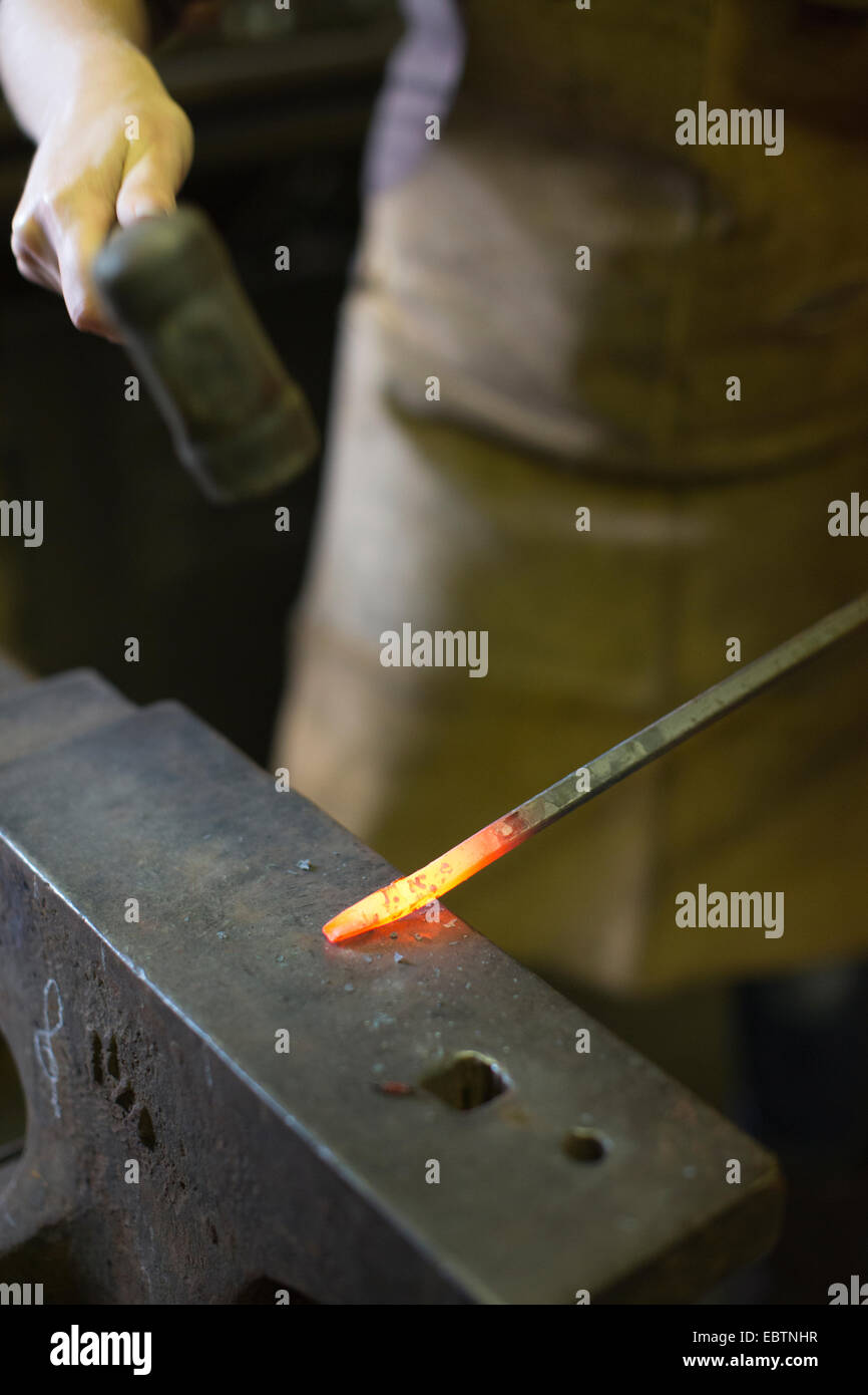 Woman blacksmith working in forge hi-res stock photography and images ...