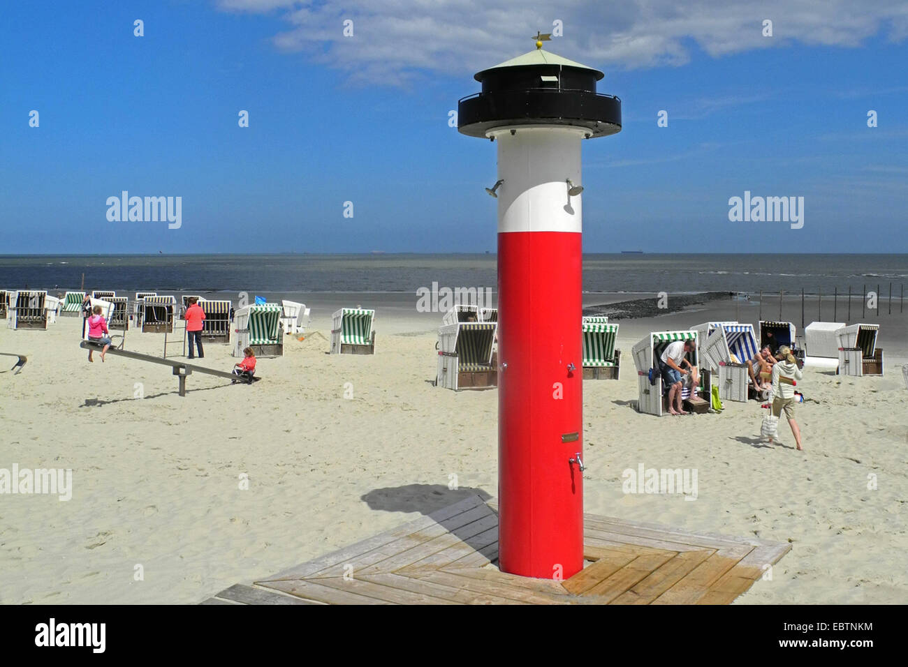 lighthouse shower at the beach of Wangerooge, Germany, Lower Saxony ...