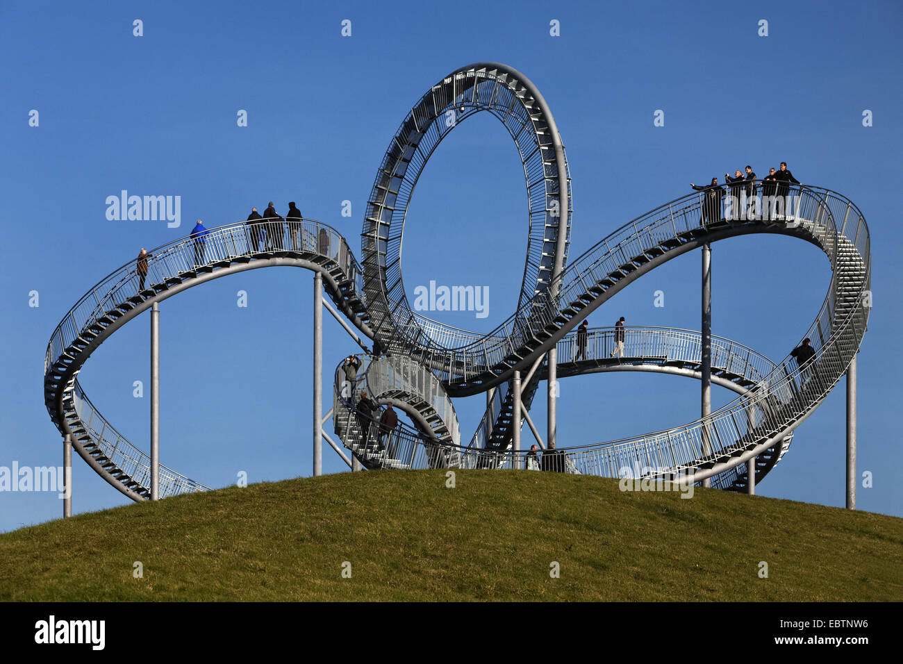 persons on the landmark Tiger and Turtle on stockpile Angerpark ...