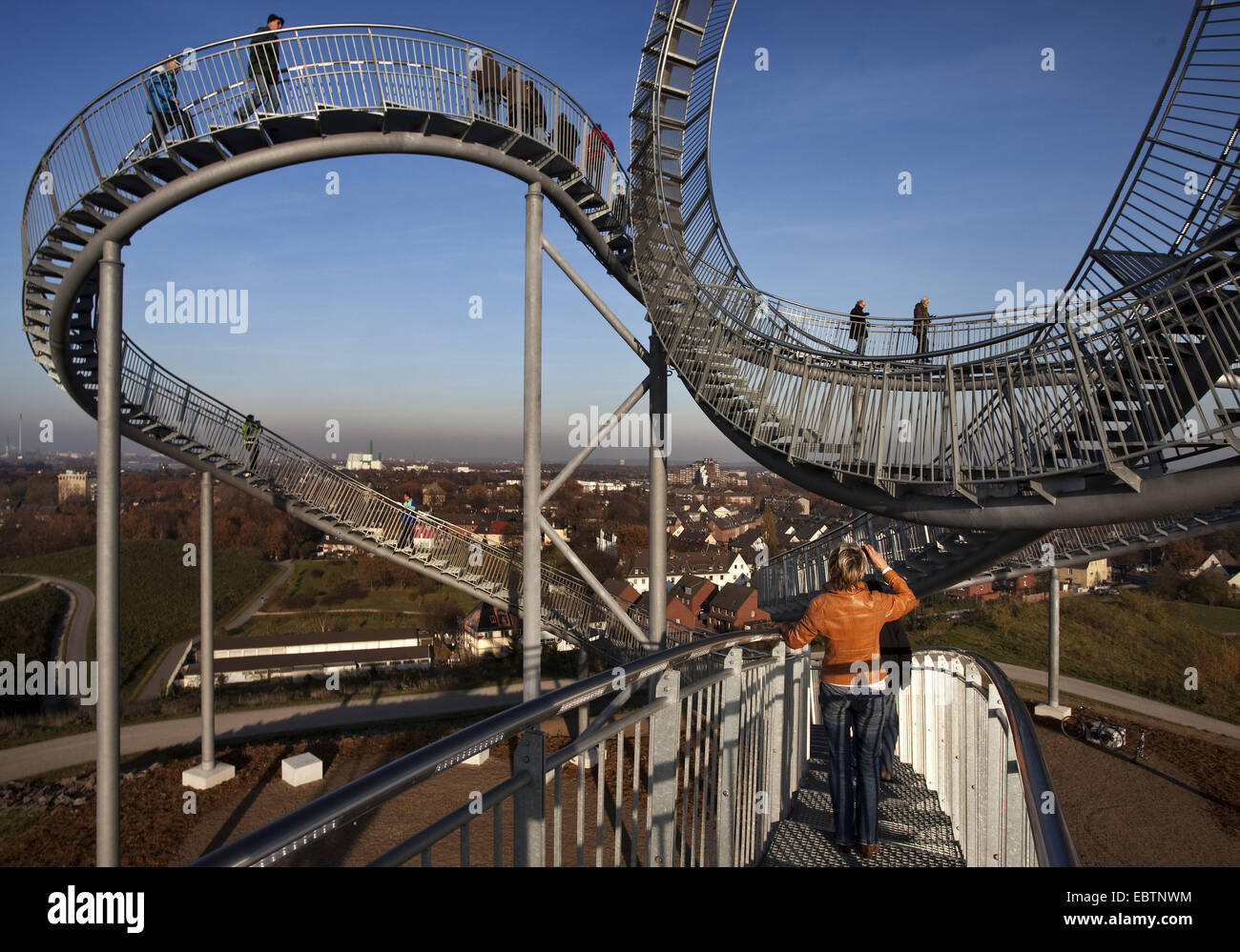 persons on the landmark Tiger and Turtle on stockpile Angerpark ...