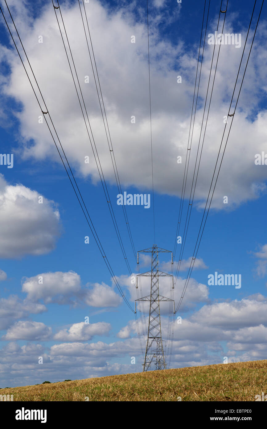 Pylon. Pylon carrying power to homes and industry. Shot taken from low ...