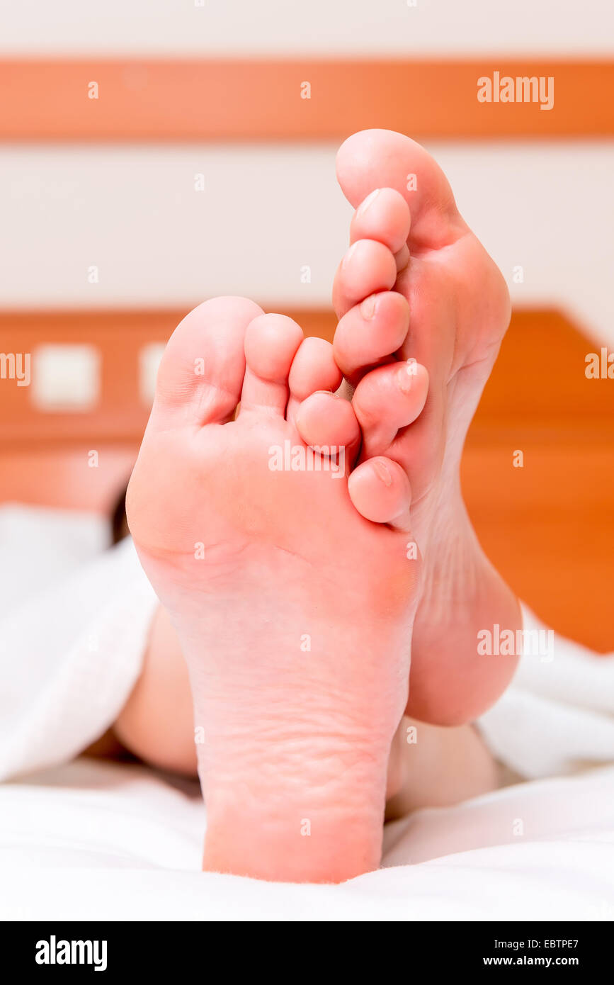 Feet of sleeping women hi-res stock photography and images - Alamy