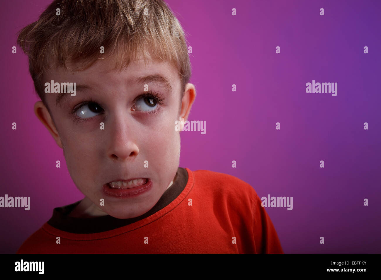 boy making face Stock Photo - Alamy