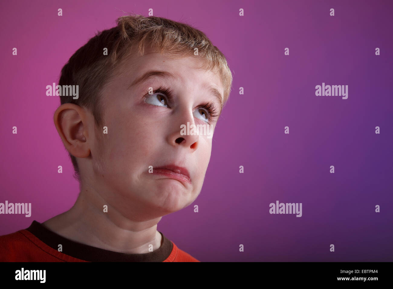 boy making face Stock Photo - Alamy