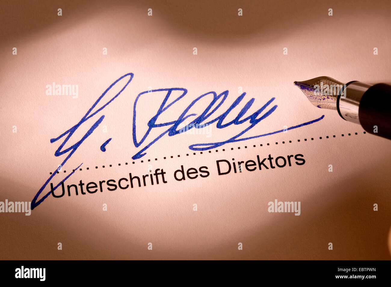 Signature of a director below an official document Stock Photo - Alamy