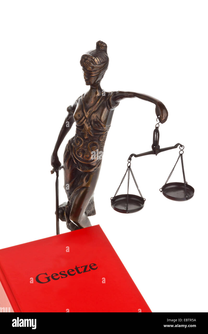Lady Justice Figure With A Law Book In Court High Resolution Stock ...