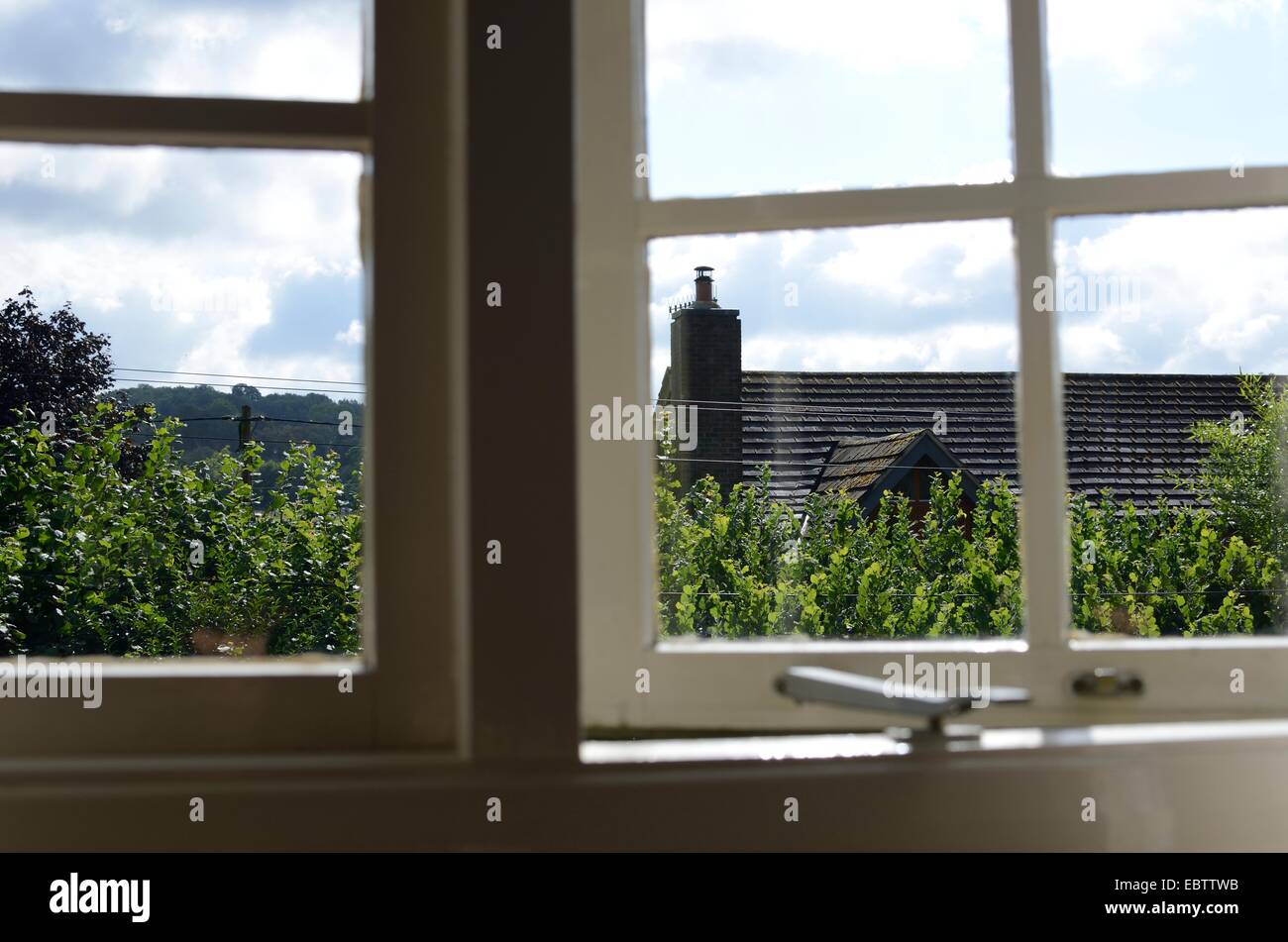 Open house window Stock Photo - Alamy
