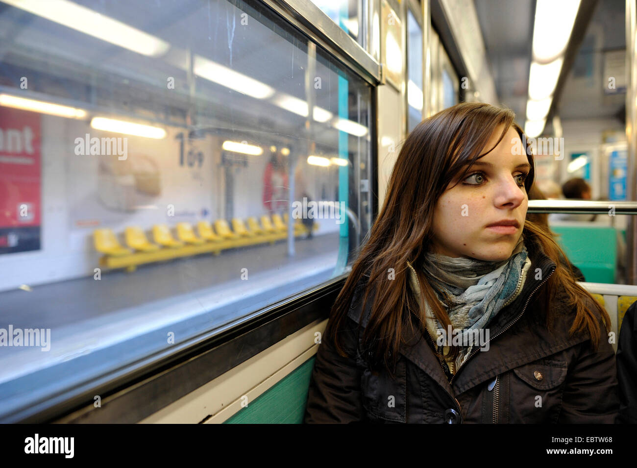 Young woman sitting in the metro hi-res stock photography and images ...
