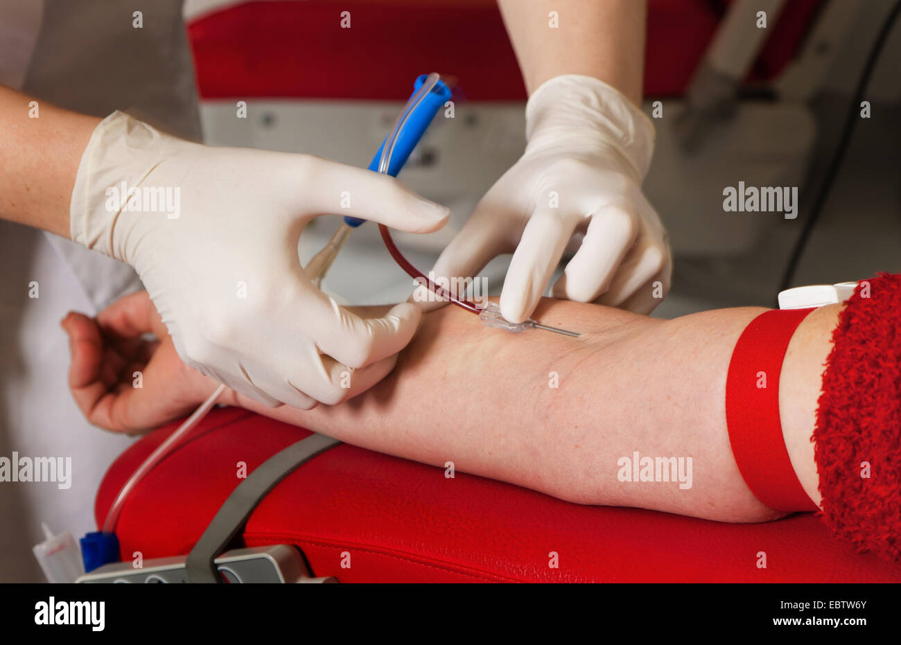 Nurse and patient taking a blood sample Stock Photo - Alamy