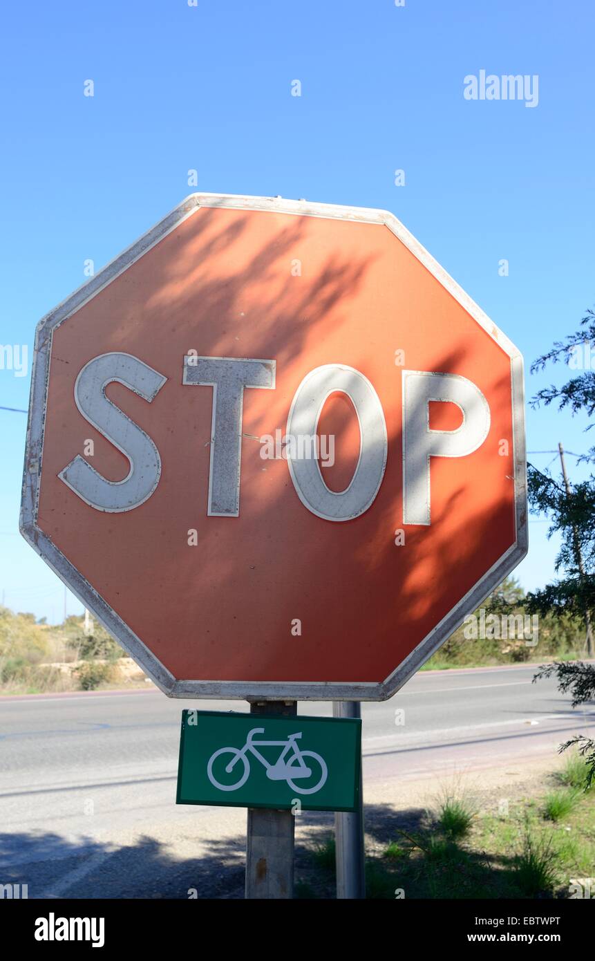 Stop Sign with cycling graphic Stock Photo - Alamy