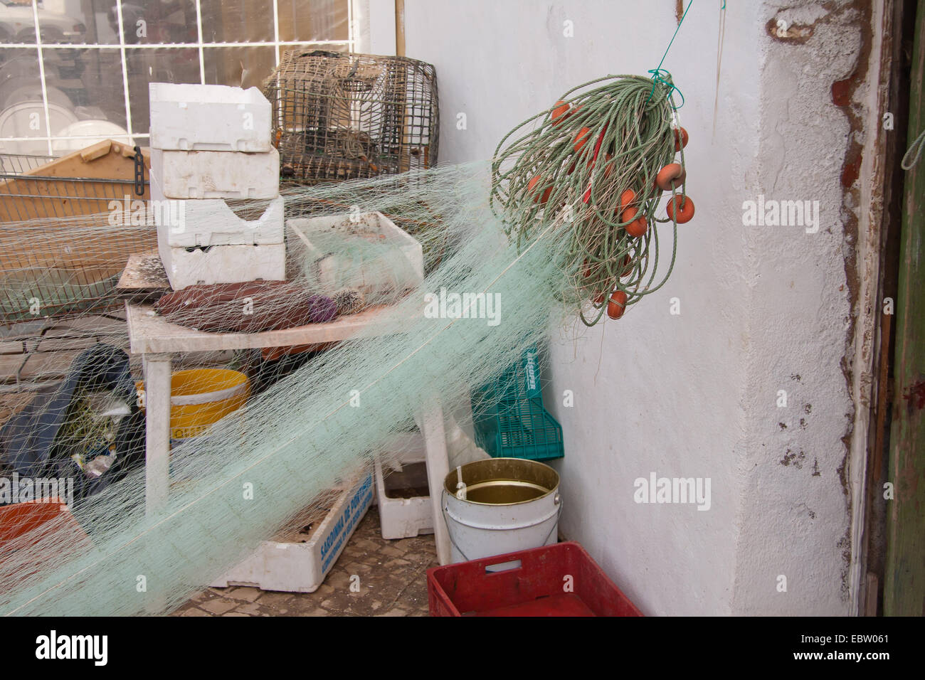Fishermen getting fishnets ready Stock Photo - Alamy