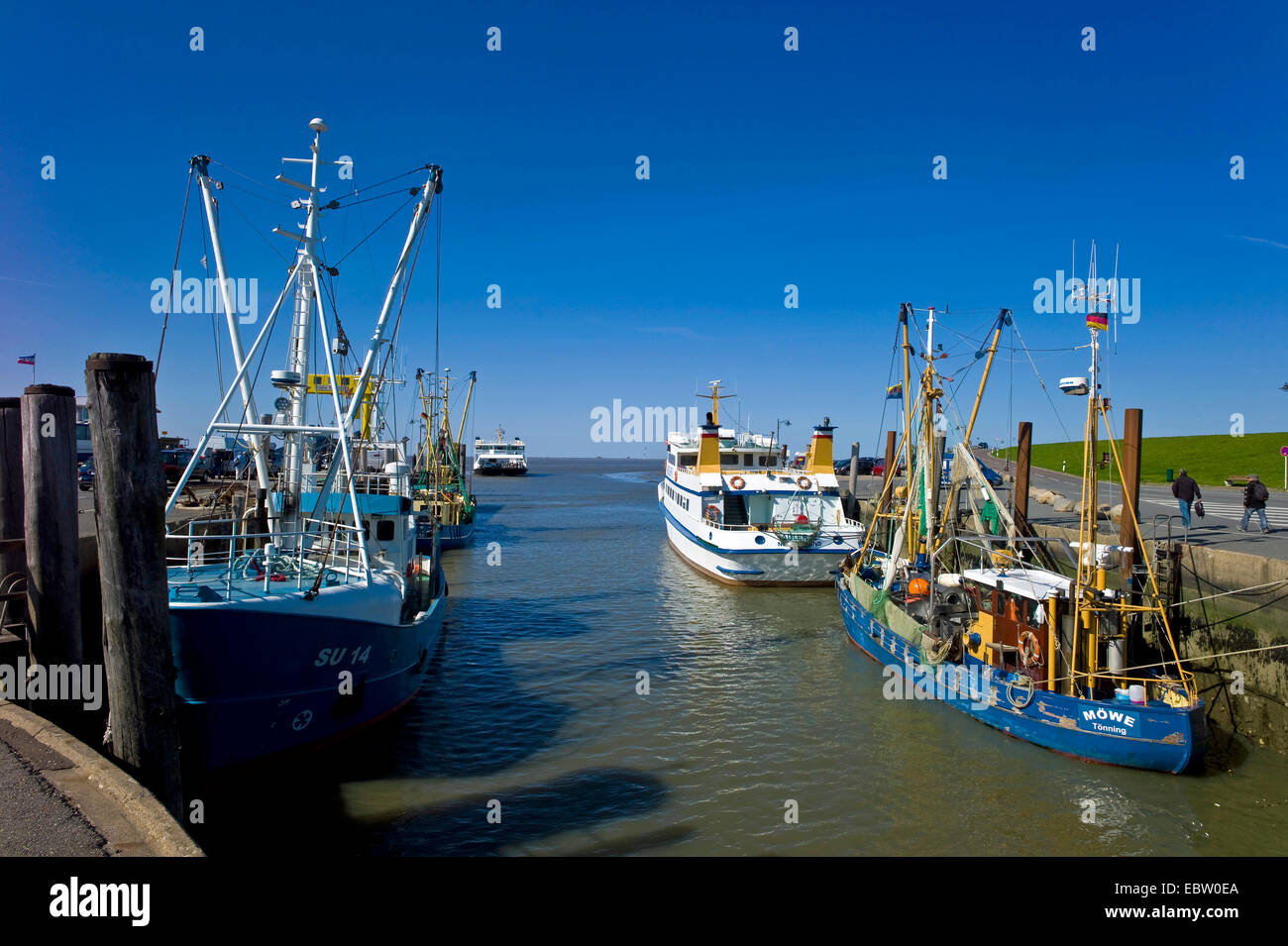 fishing trawlers and ferry boat in harbour, Germany, Schleswig-Holstein ...