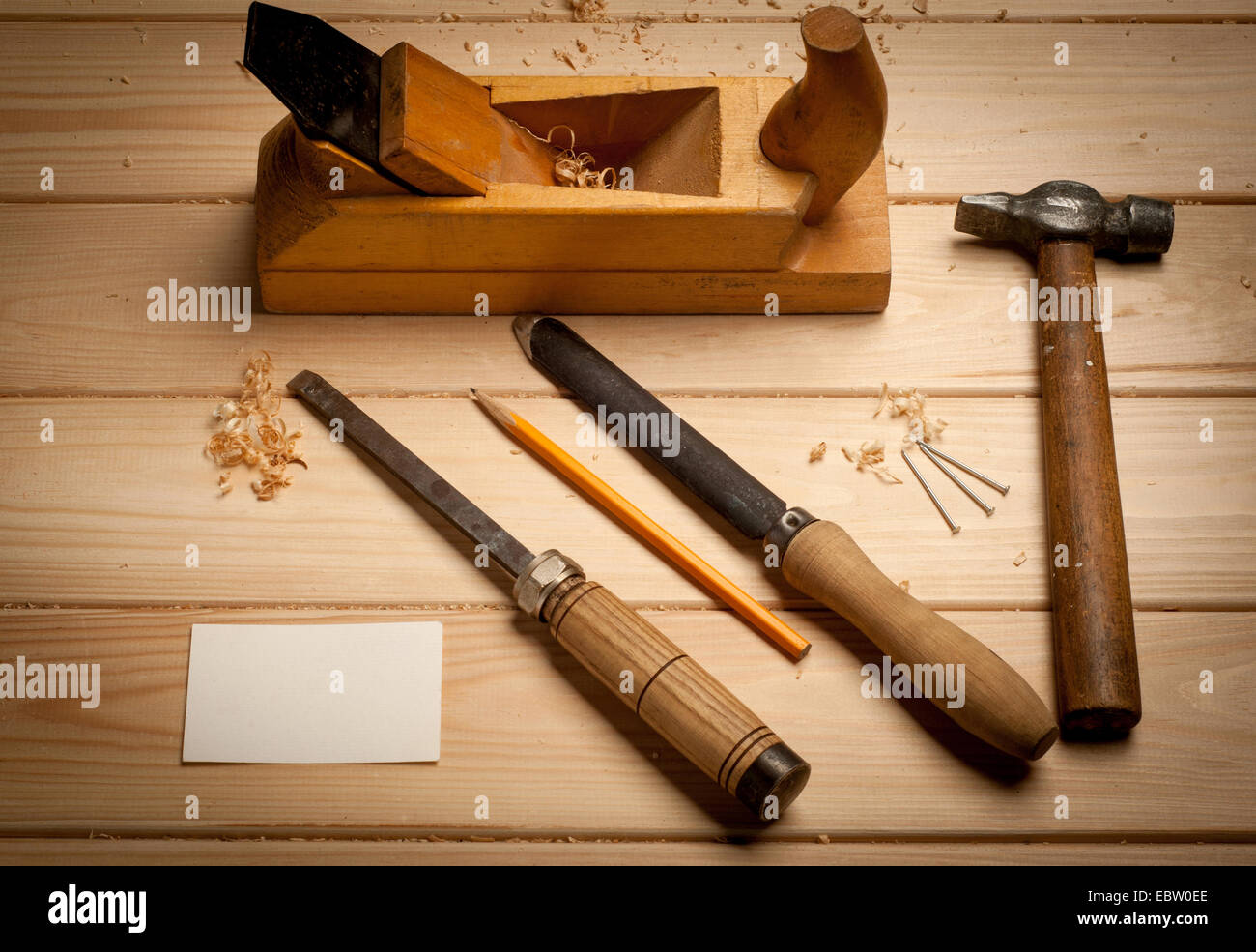 carpenter tools in pine wood table Stock Photo - Alamy
