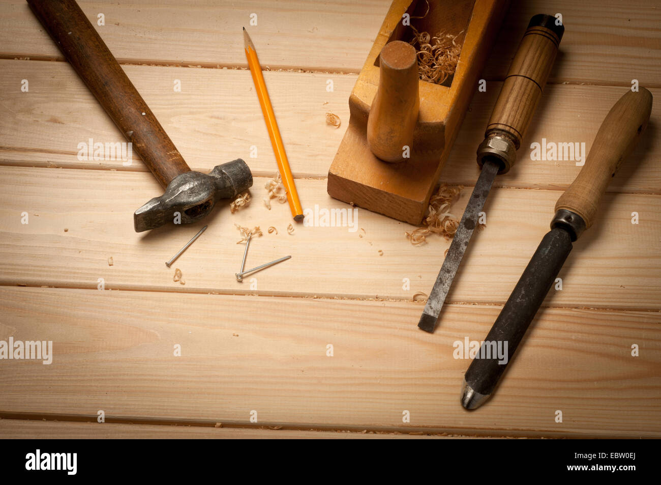 carpenter tools in pine wood table Stock Photo - Alamy