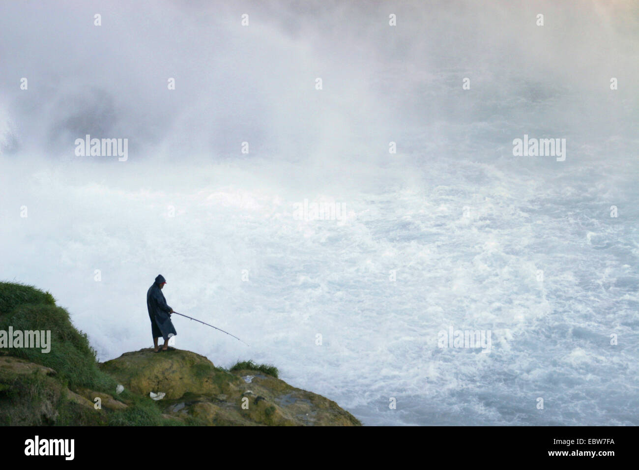 angler at Lara waterfalls near Antalya, Turkey, Turkish Riviera ...