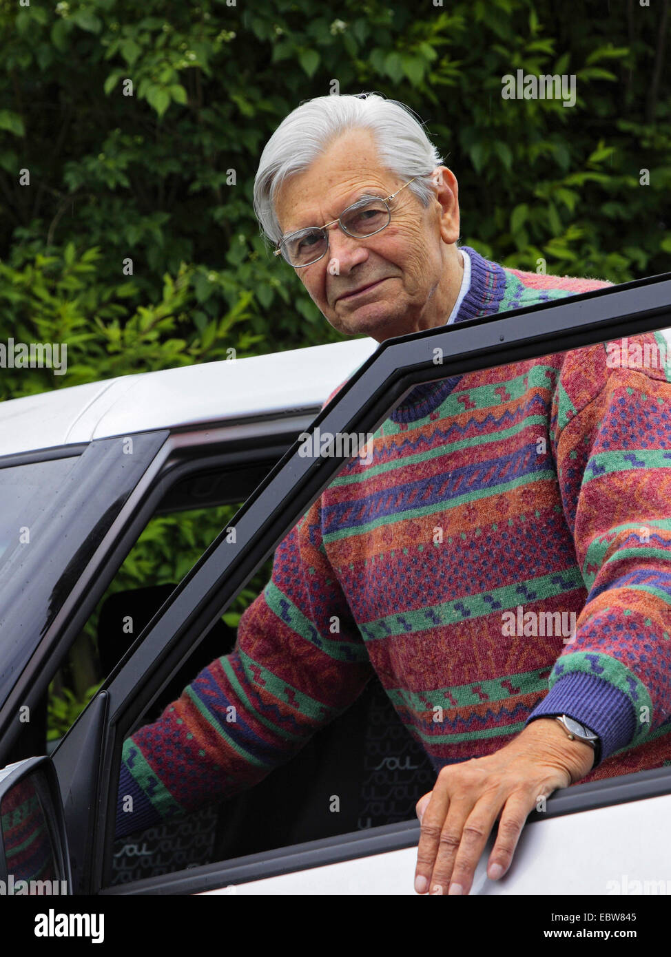 senior getting into a car Stock Photo - Alamy