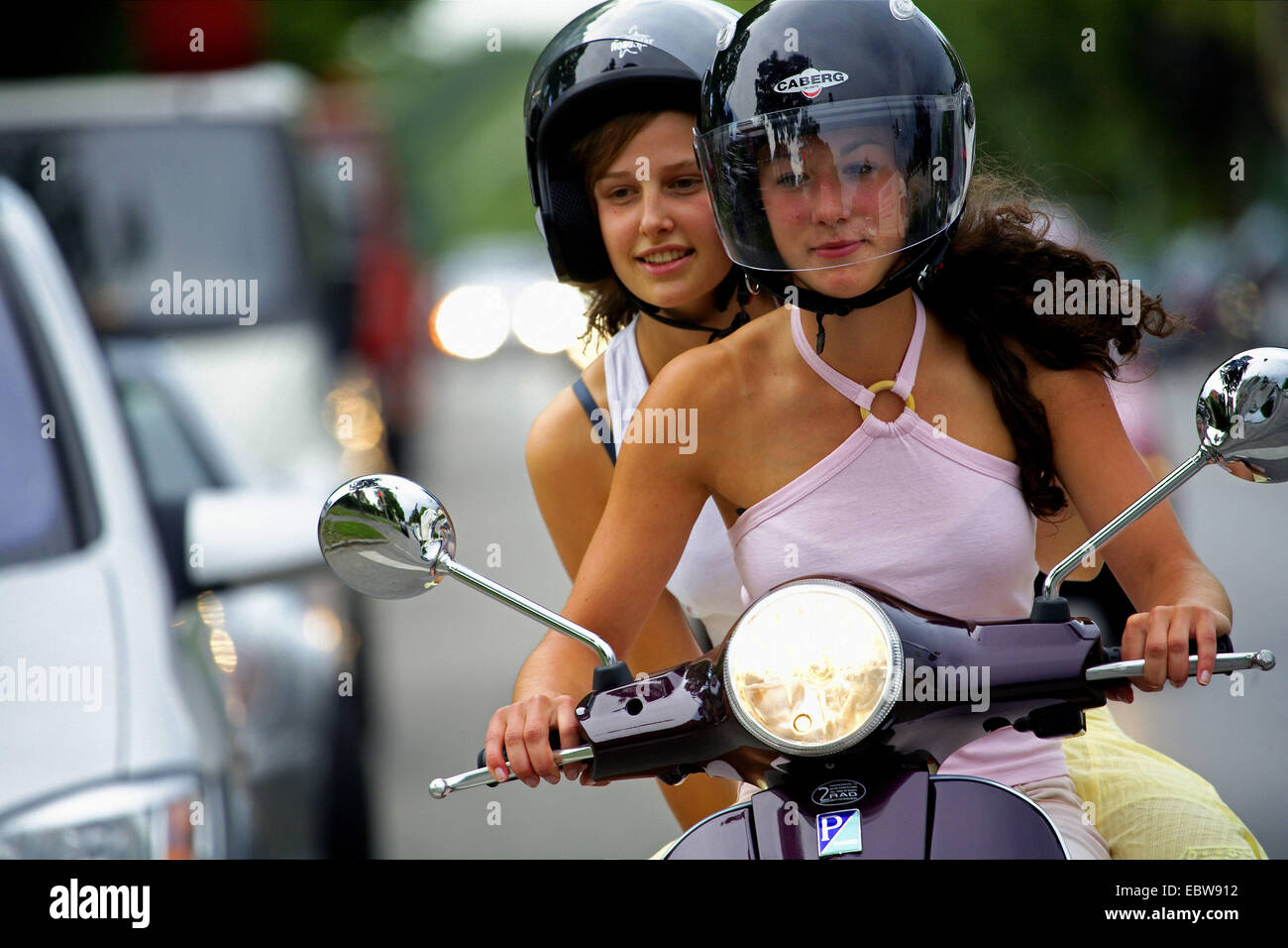 Girlfriends on motor scooter hi-res stock photography and images - Alamy
