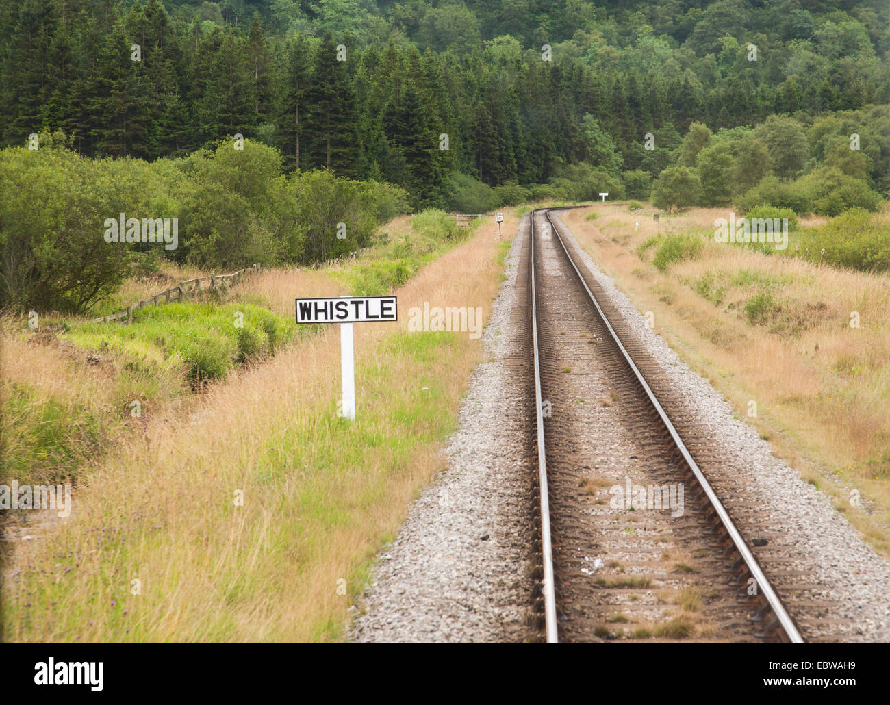 whistle sign next to railway Stock Photo - Alamy