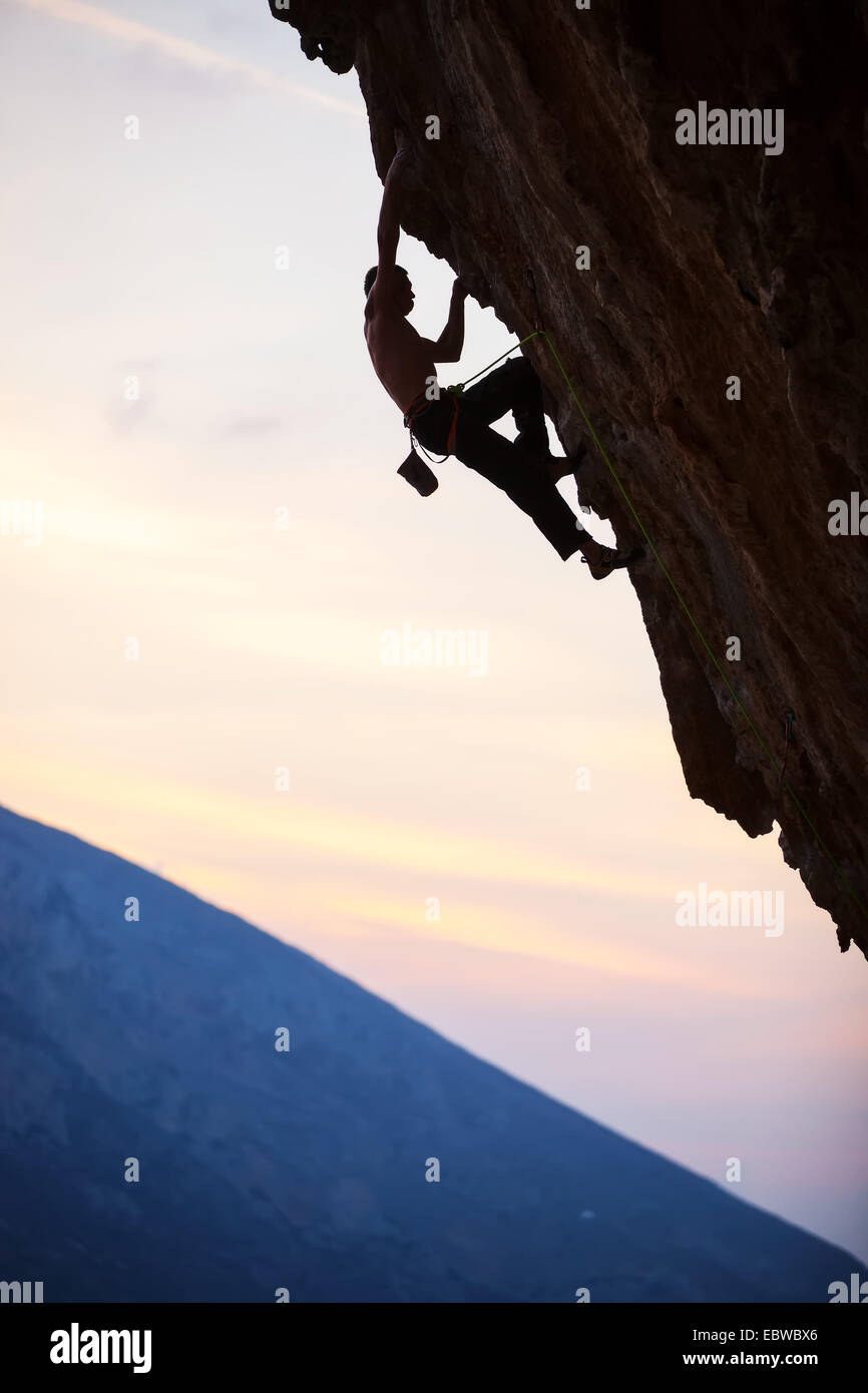 Silhouette of a rock climber Stock Photo - Alamy