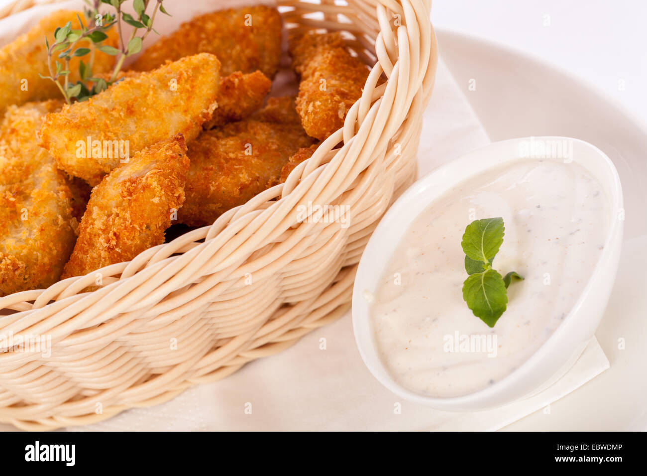 Crisp crunchy golden chicken legs and wings deep fried in bread crumbs ...